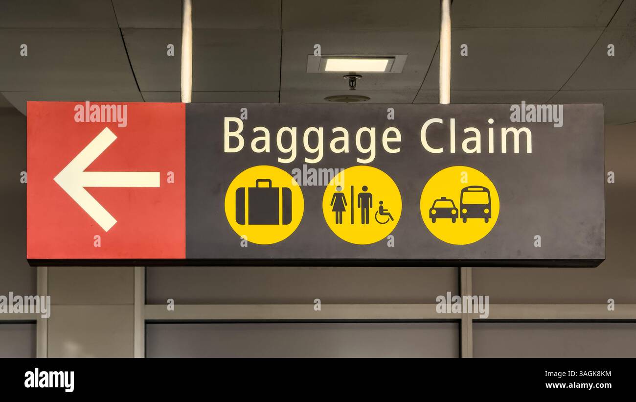SeaTac, WA, USA - March 16, 2025; Airport baggage claim sign with ...