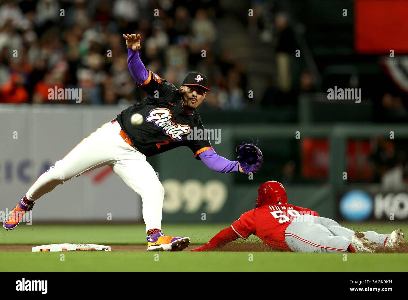 Cincinnati Reds left fielder Blake Dunn (59) steals second base as the ...