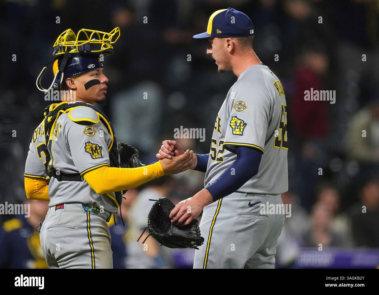 Milwaukee Brewers catcher William Contreras, left, congratulates relief ...