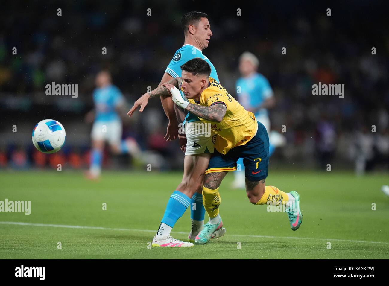 Brian Rodriguez of Mexico's America, front, clashes with Andres Montano ...