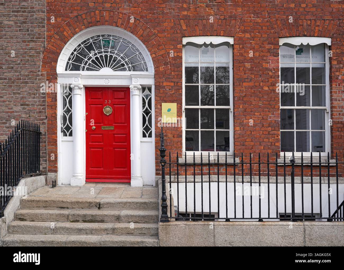 Bright red front door of Dublin solicitor's office in Georgian ...