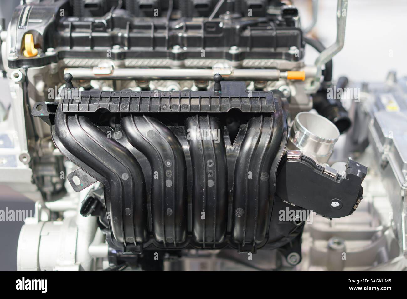 detailed look at a contemporary engine intake manifold, showcasing its ...