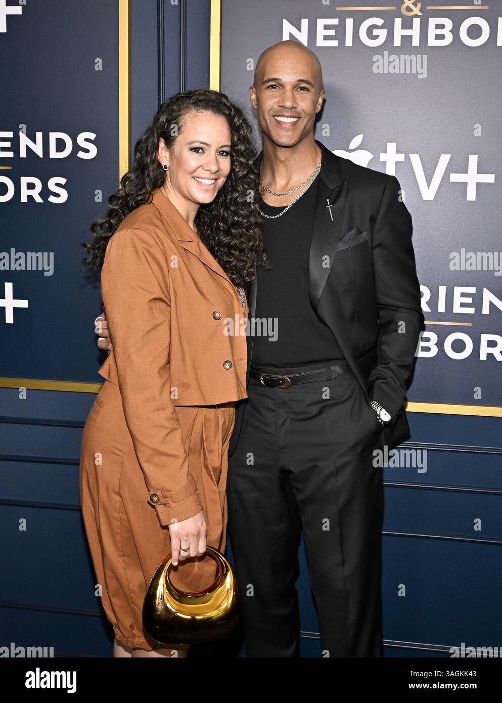 Mark Tallman, right, and wife Jessica Moye Tallman attend the Apple TV+ ...
