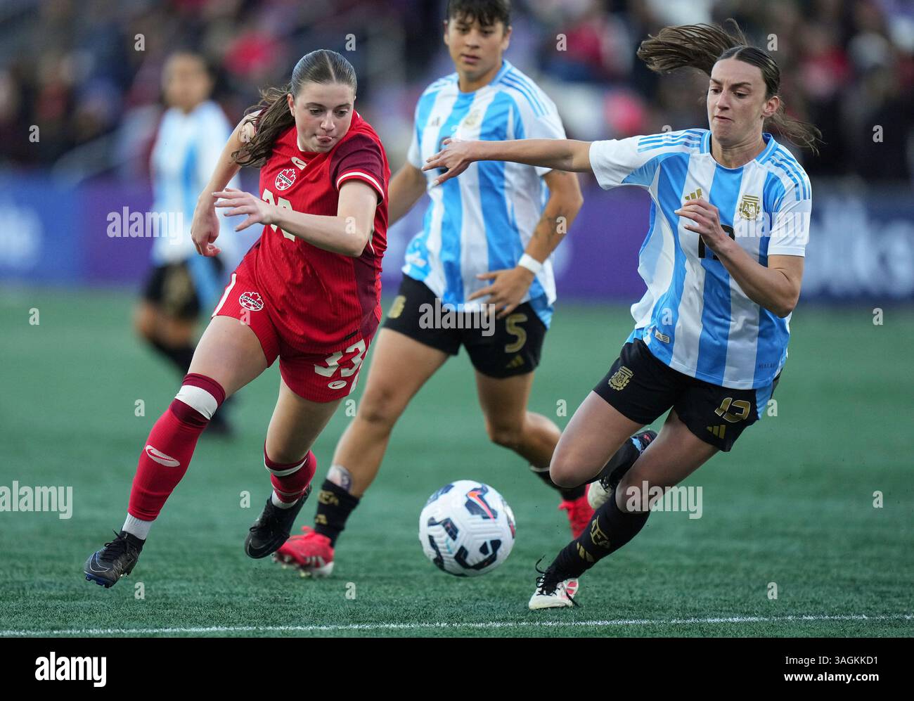 Canada's Kayla Briggs, left, and Argentina's Sophia Braun vie for the ...