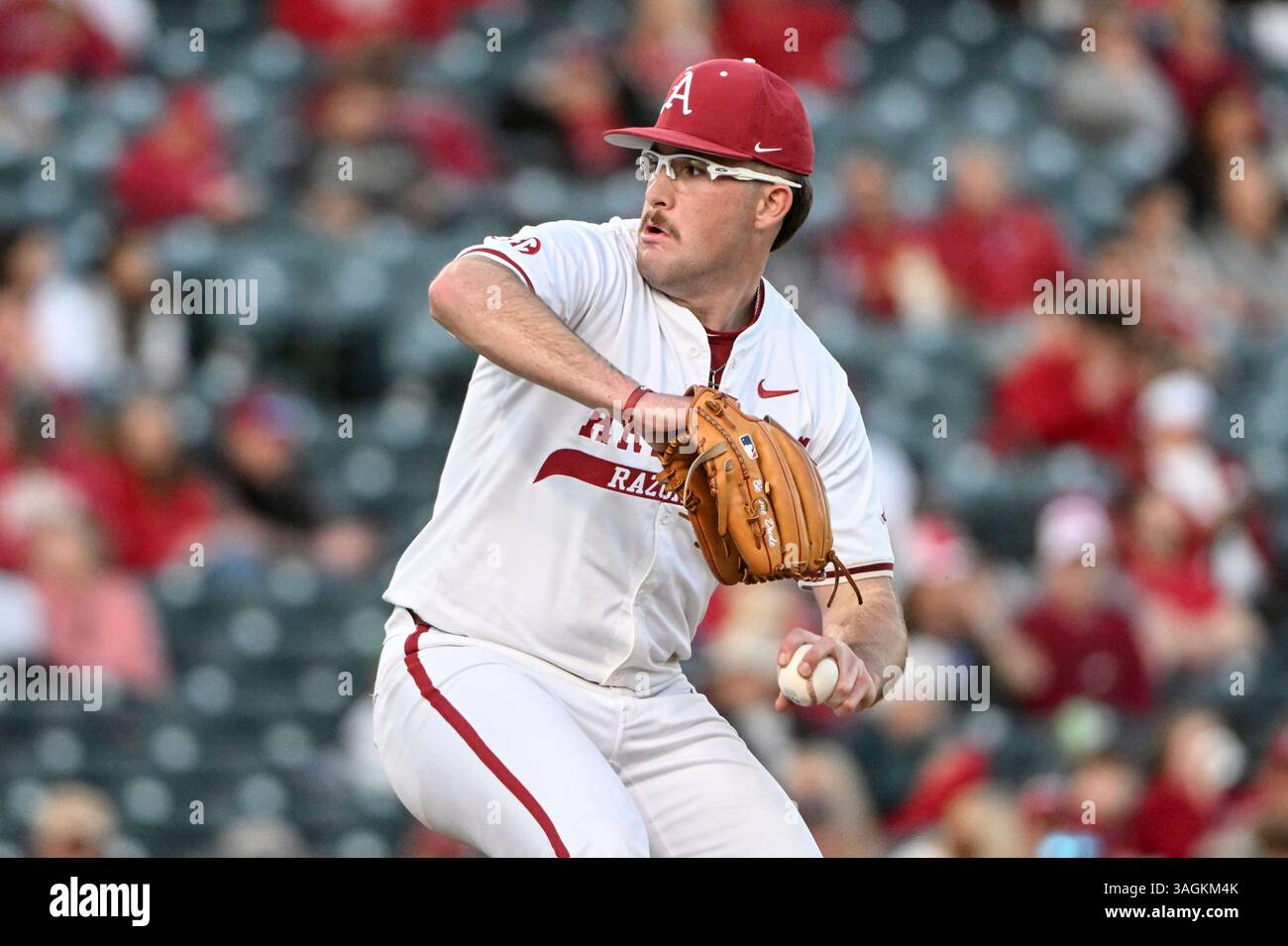 Arkansas pitcher Colin Fisher (38) throws a pitch against Arkansas State during an NCAA baseball ...