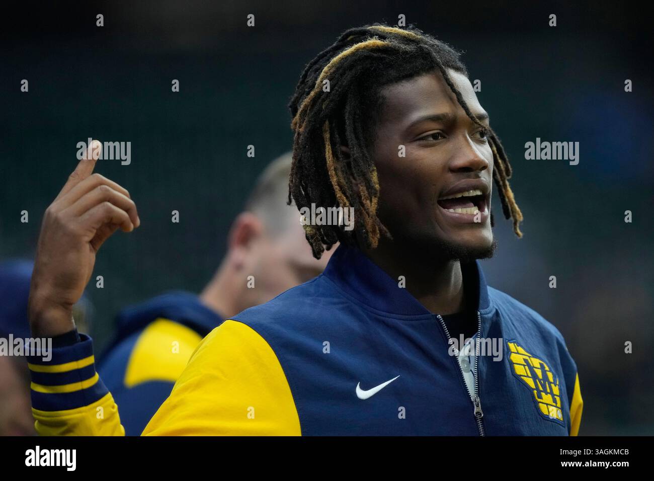 Milwaukee Brewers' Abner Uribe looks on before a baseball game against ...