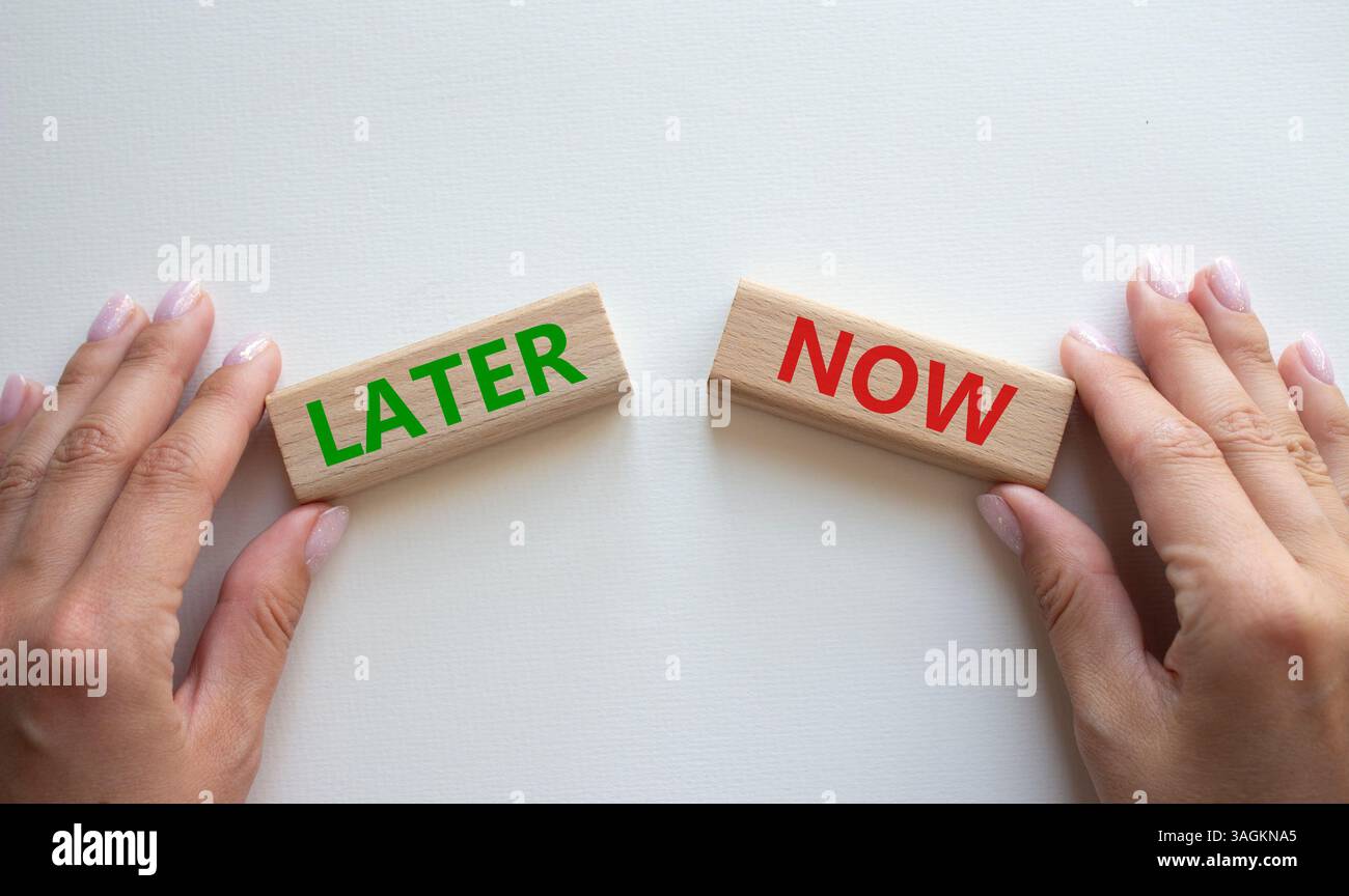 Now vs Later symbol. Concept word Now vs Later on wooden blocks ...