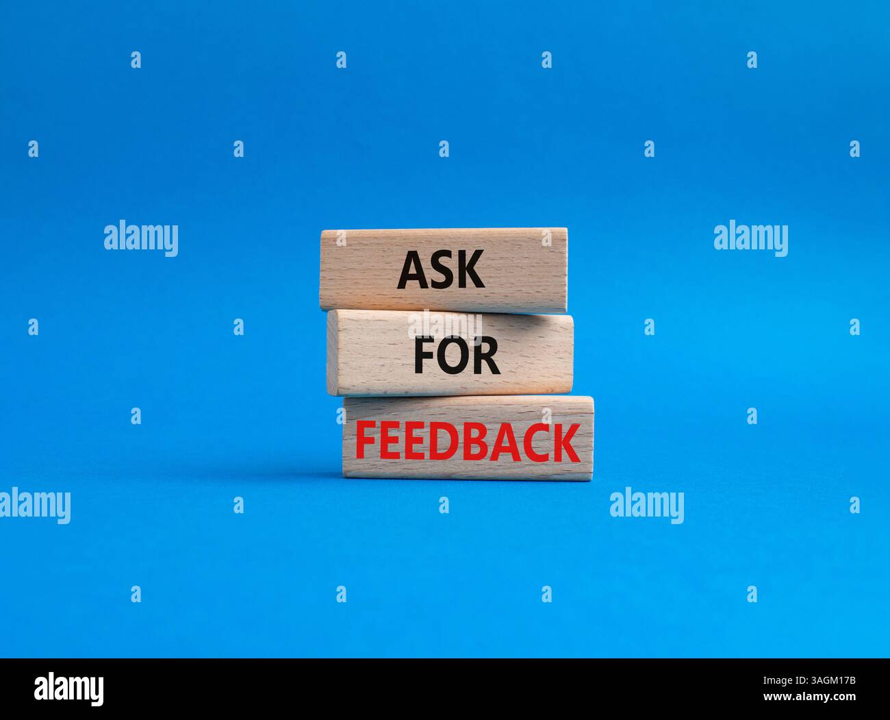 Feedback symbol. Concept word Ask for feedback on wooden blocks ...