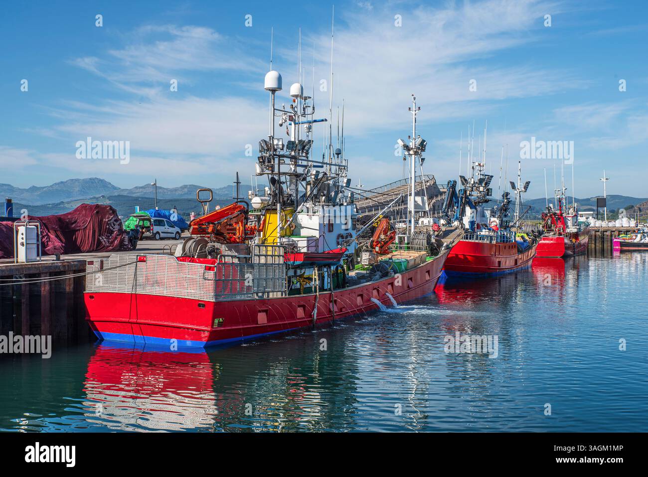 Fishing boat with a fish tank system to keep fish alive, in the port of ...