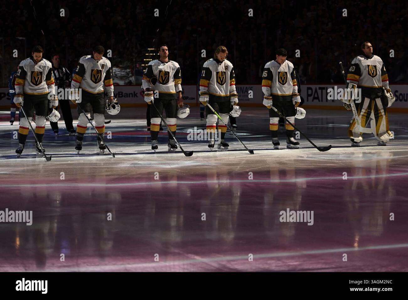 Members of the Vegas Golden Knights stand during the singing of the ...