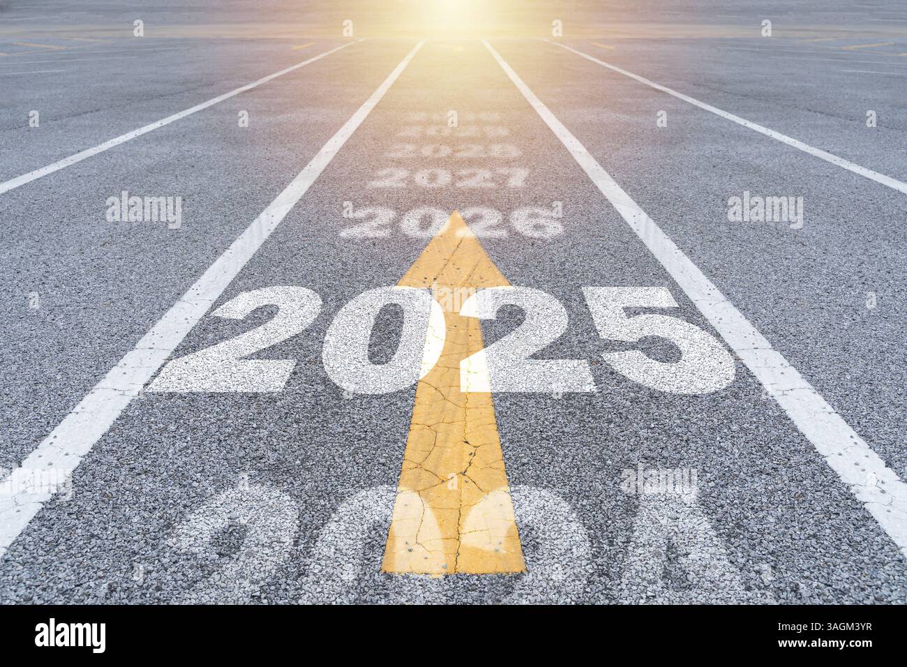 New year 2025 or straight forward concept. Text 2025, 2026, 2027, 2028 written on the road in ...