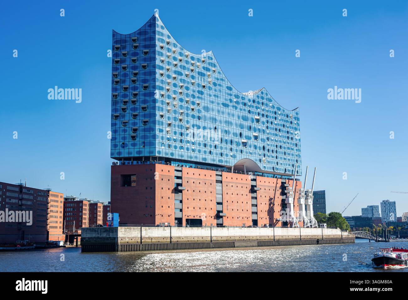 The glossy glass facade of the iconic Elbphilharmonie concert hall in ...