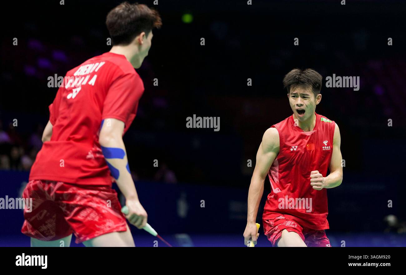 (250409) -- NINGBO, April 9, 2025 (Xinhua) -- Chen Boyang/Liu Yi (R) of China react during the ...