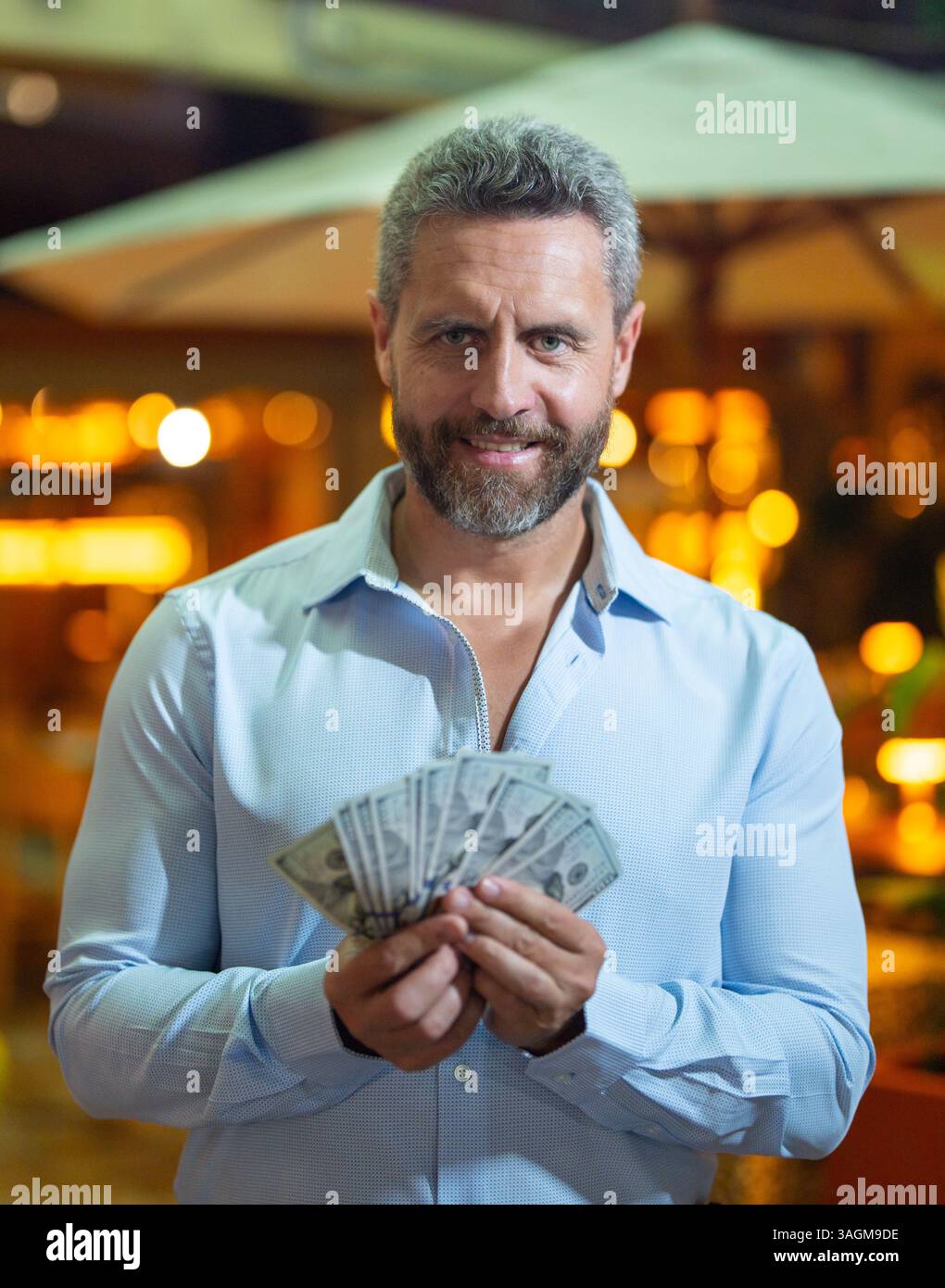 Business man holding money cash. Businessman with money. Man counting ...