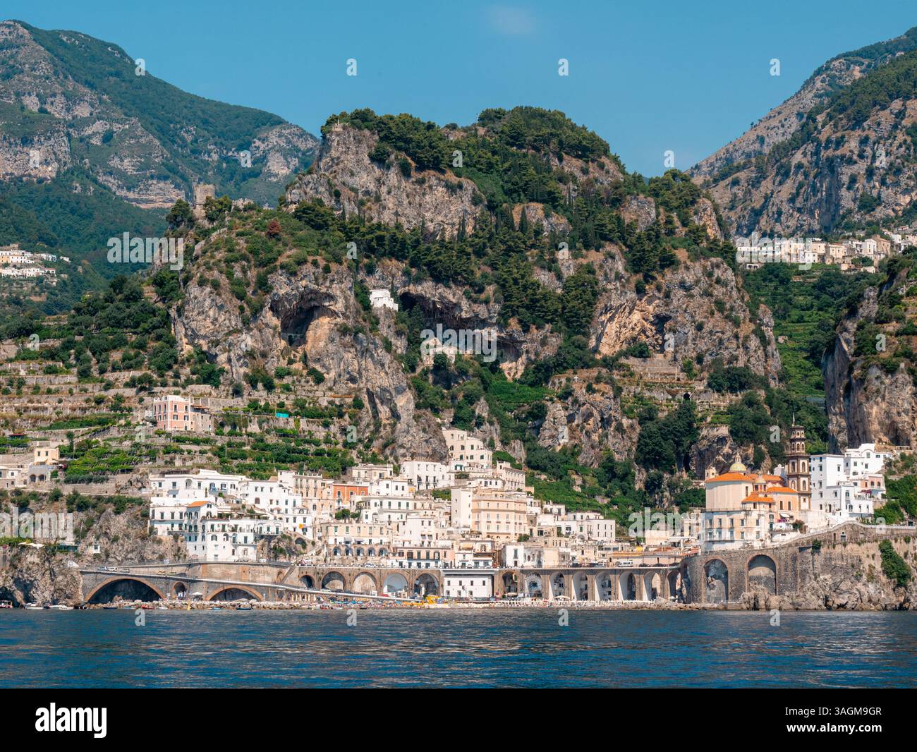 Aerial View of Atrani Village on the Amalfi Coast – White Buildings, Historic Stone Bridge, and ...