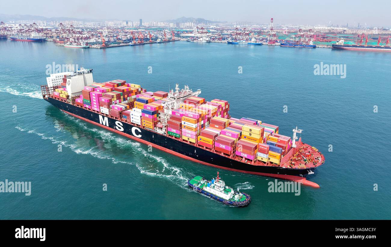 QINGDAO, CHINA - APRIL 9, 2025 - A cargo ship loaded with foreign trade ...