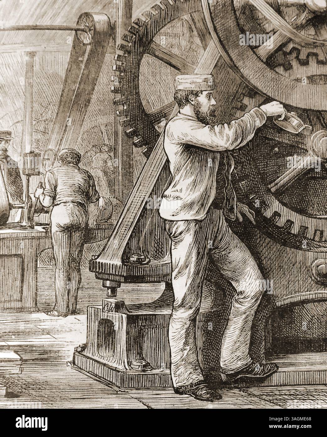 A 19th century engraving of an engineer oiling giant cog wheels Stock ...