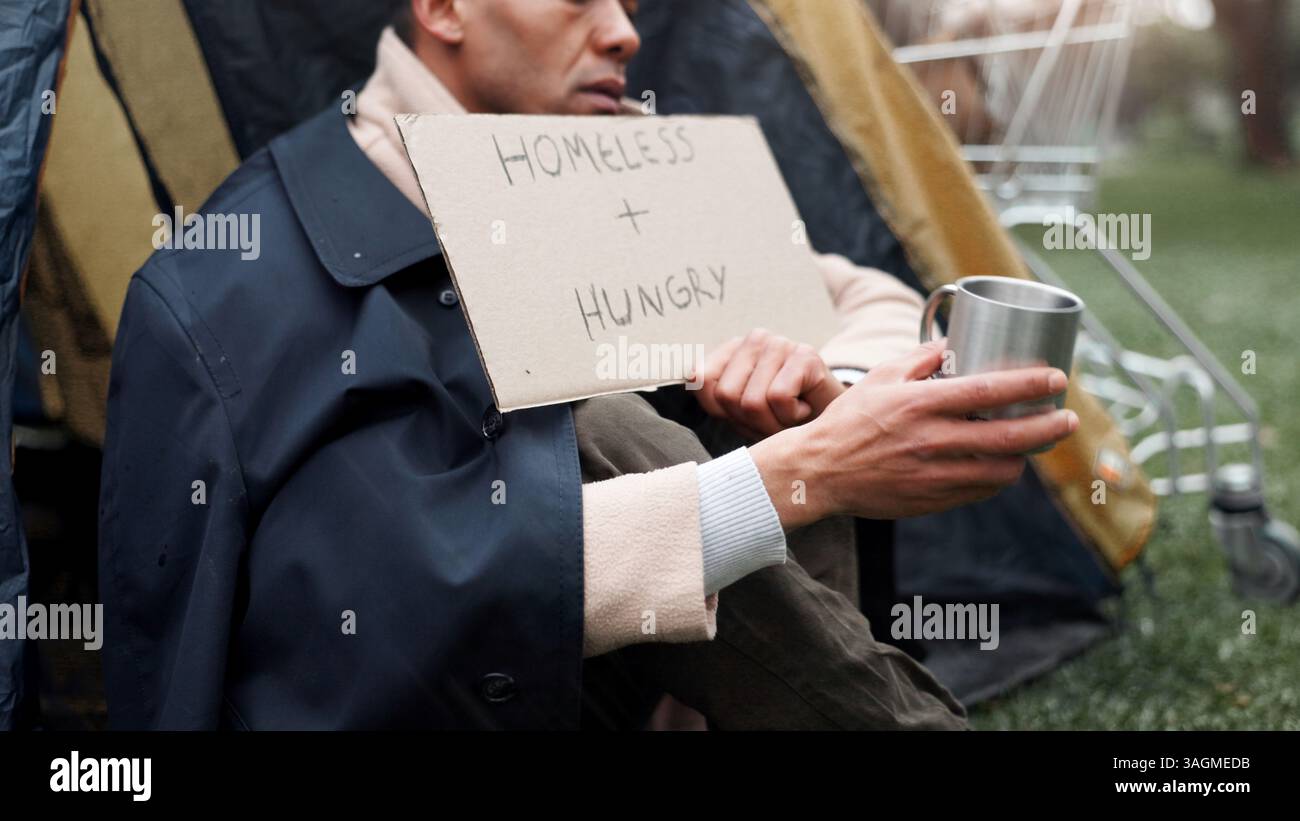 Hands homeless poverty cardboard hi-res stock photography and images ...