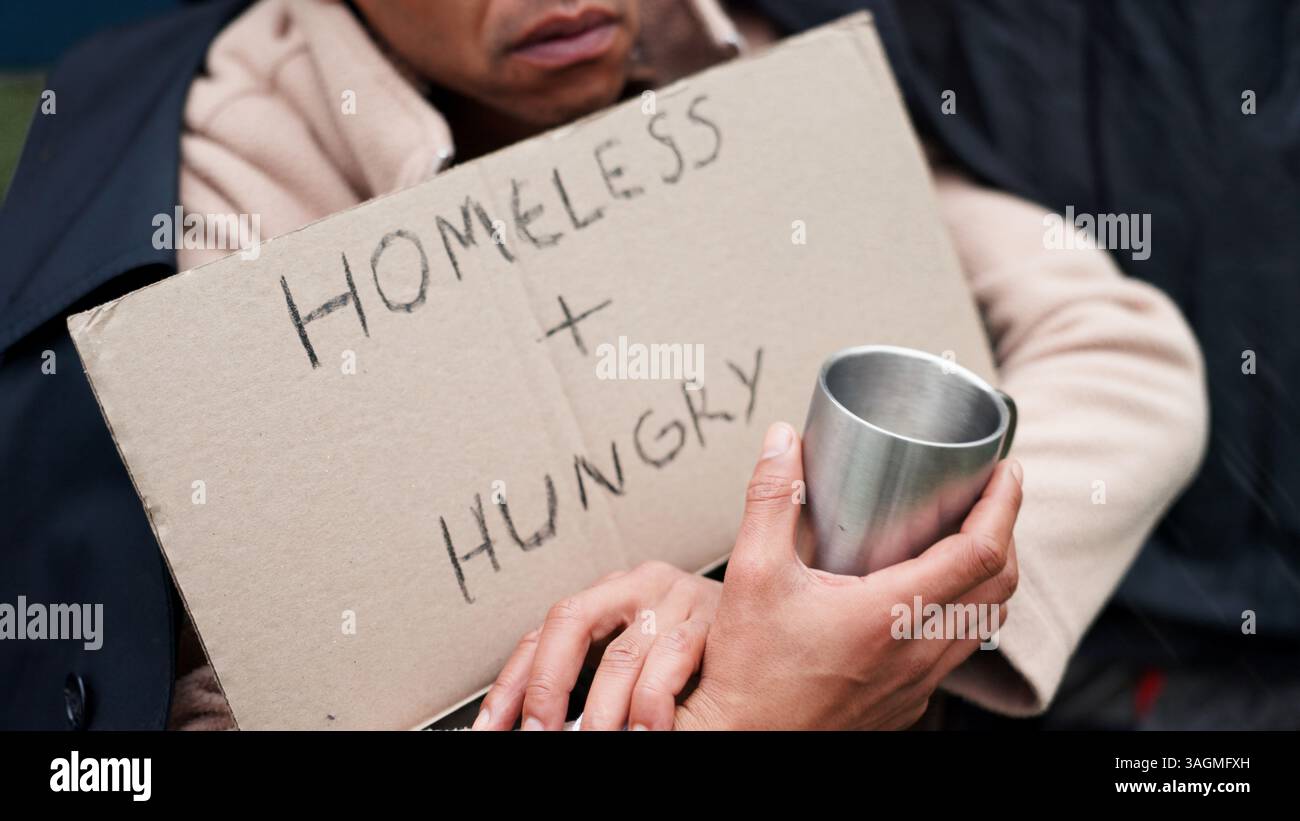 Hands, homeless and cardboard sign with cup, poverty and begging for ...