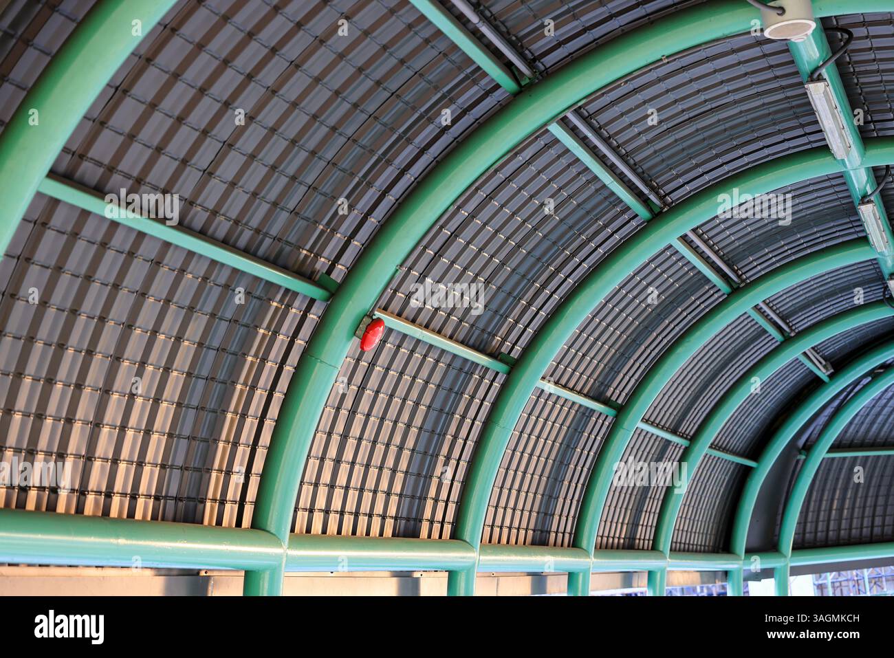 Arched roof made from metal sheet of Pedestrian pathway or corridor or ...