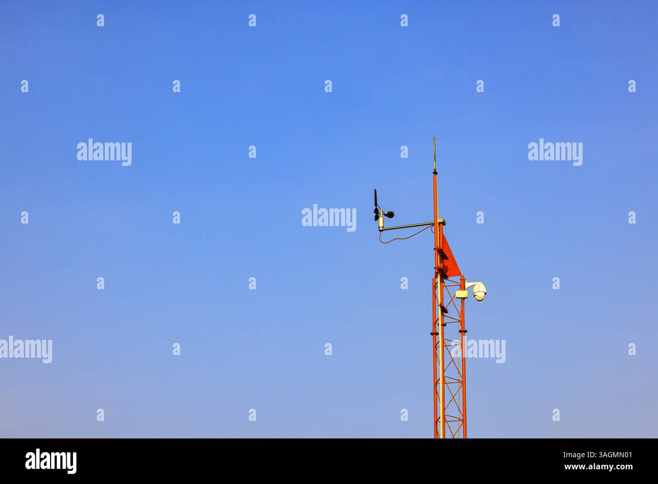 wind speed measurement or anemometer on red pole at small weather ...