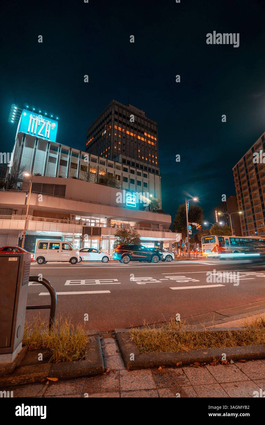 Night cityscape of the M'ZA department store in downtown Kanazawa with ...
