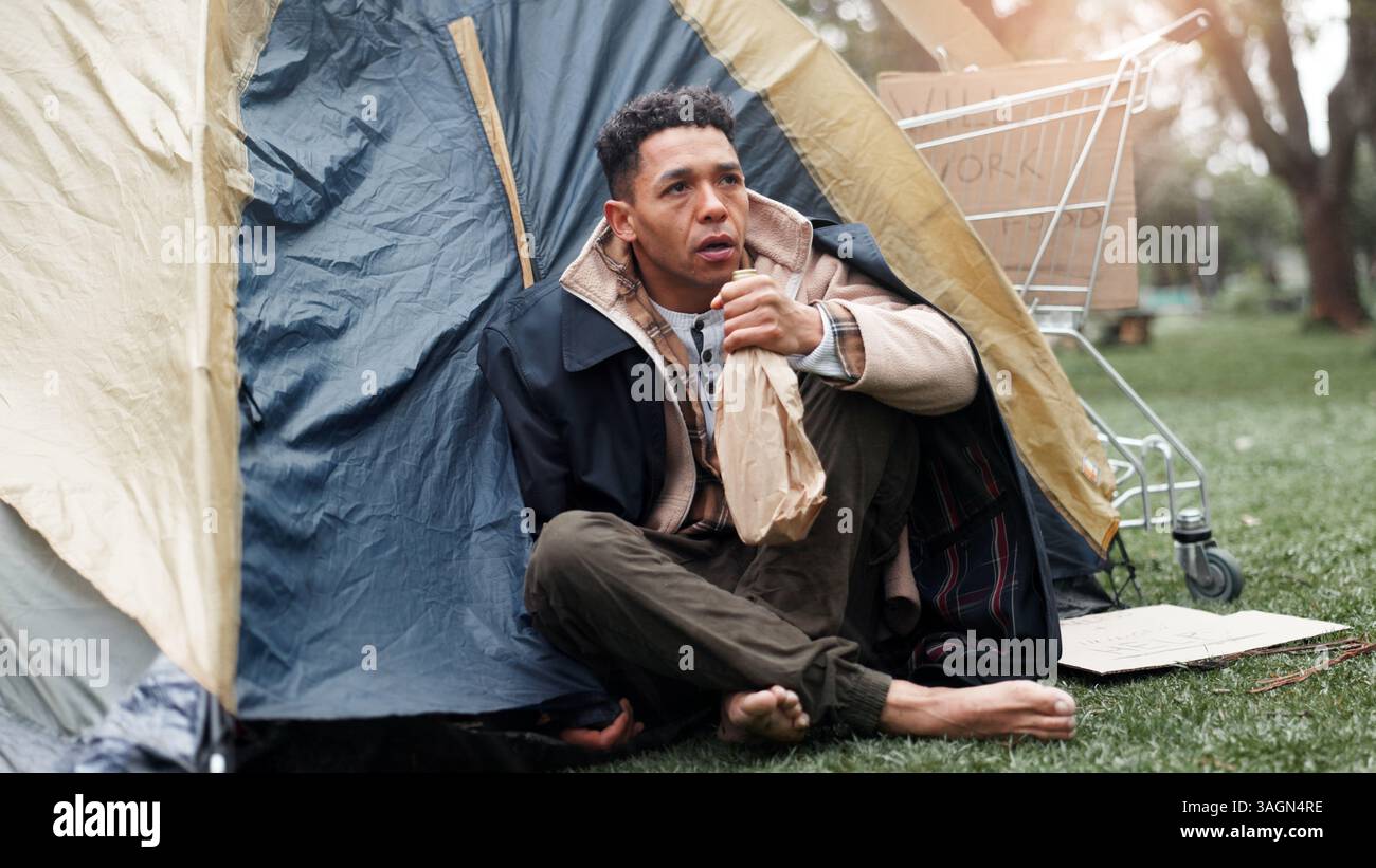 Man, poverty and outdoor with alcohol, homeless and tent with addiction ...