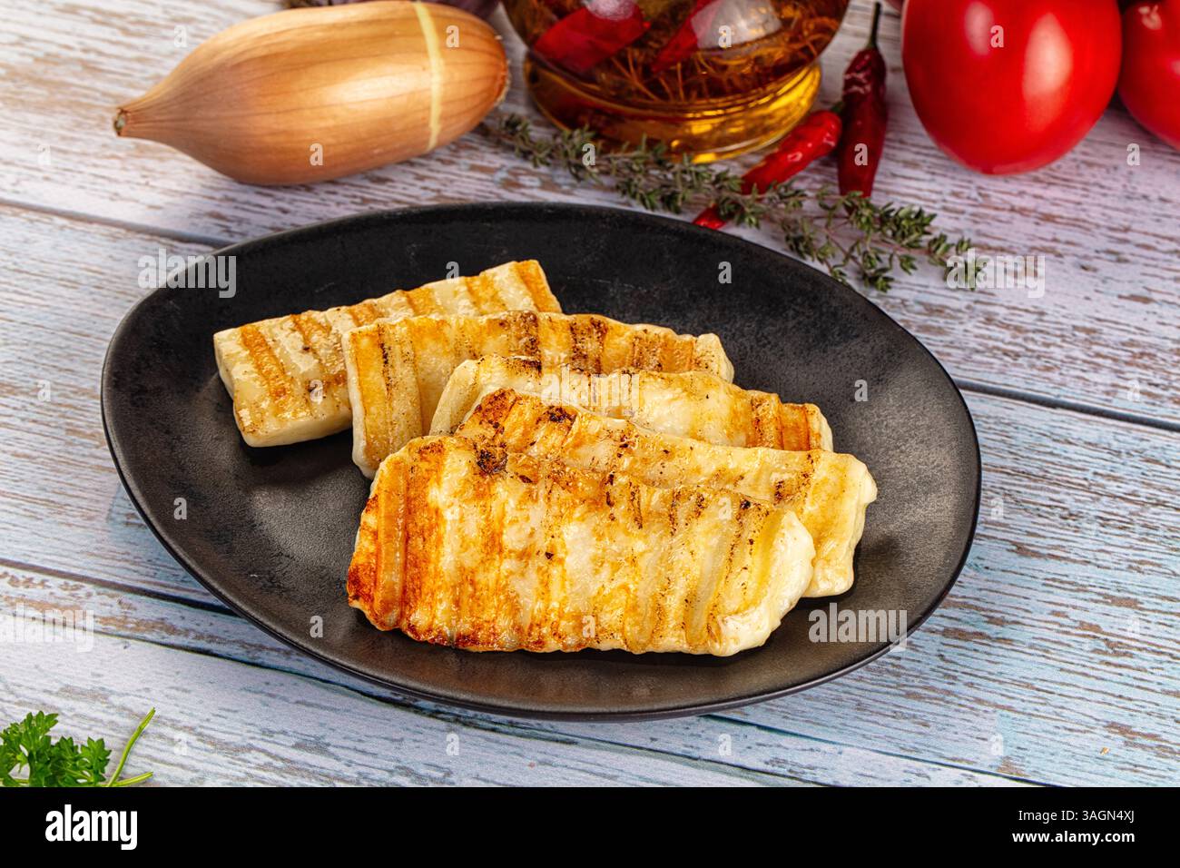 Greek traditional grilled halloumi cheese snack Stock Photo - Alamy
