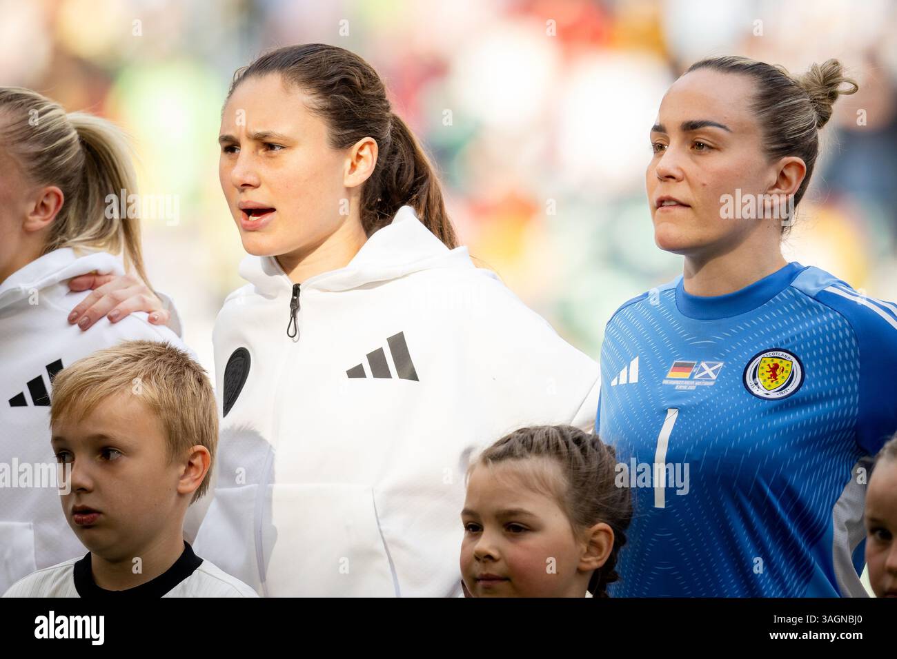 Wolfsburg, Germany. 08th Apr, 2025. Emma Lawton (L) and goalkeeper Lee ...