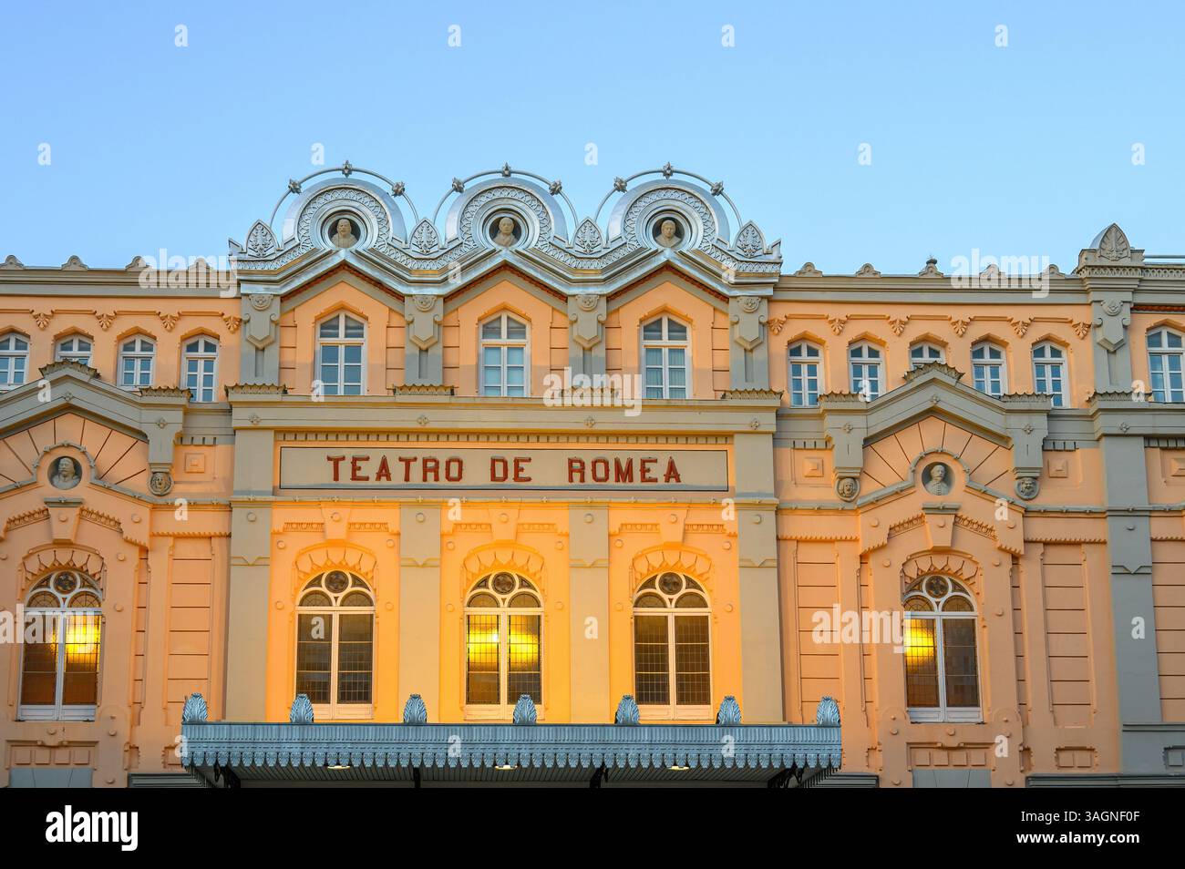 Illuminated upper section of the facade of the Teatro de Romea Stock ...