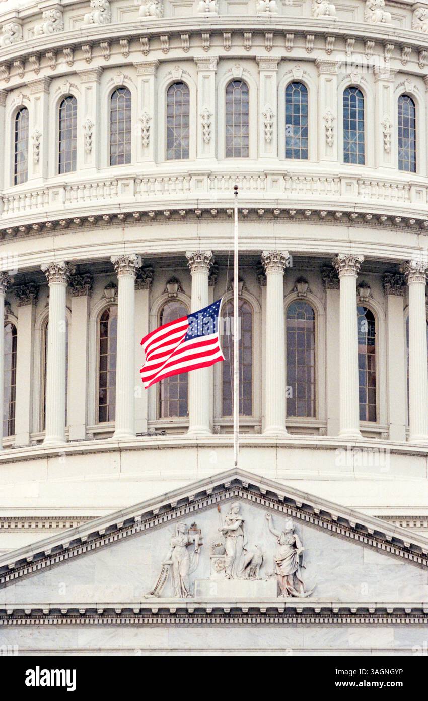 July 24, 1998 - US Capitol lower the flag to half mast following a ...