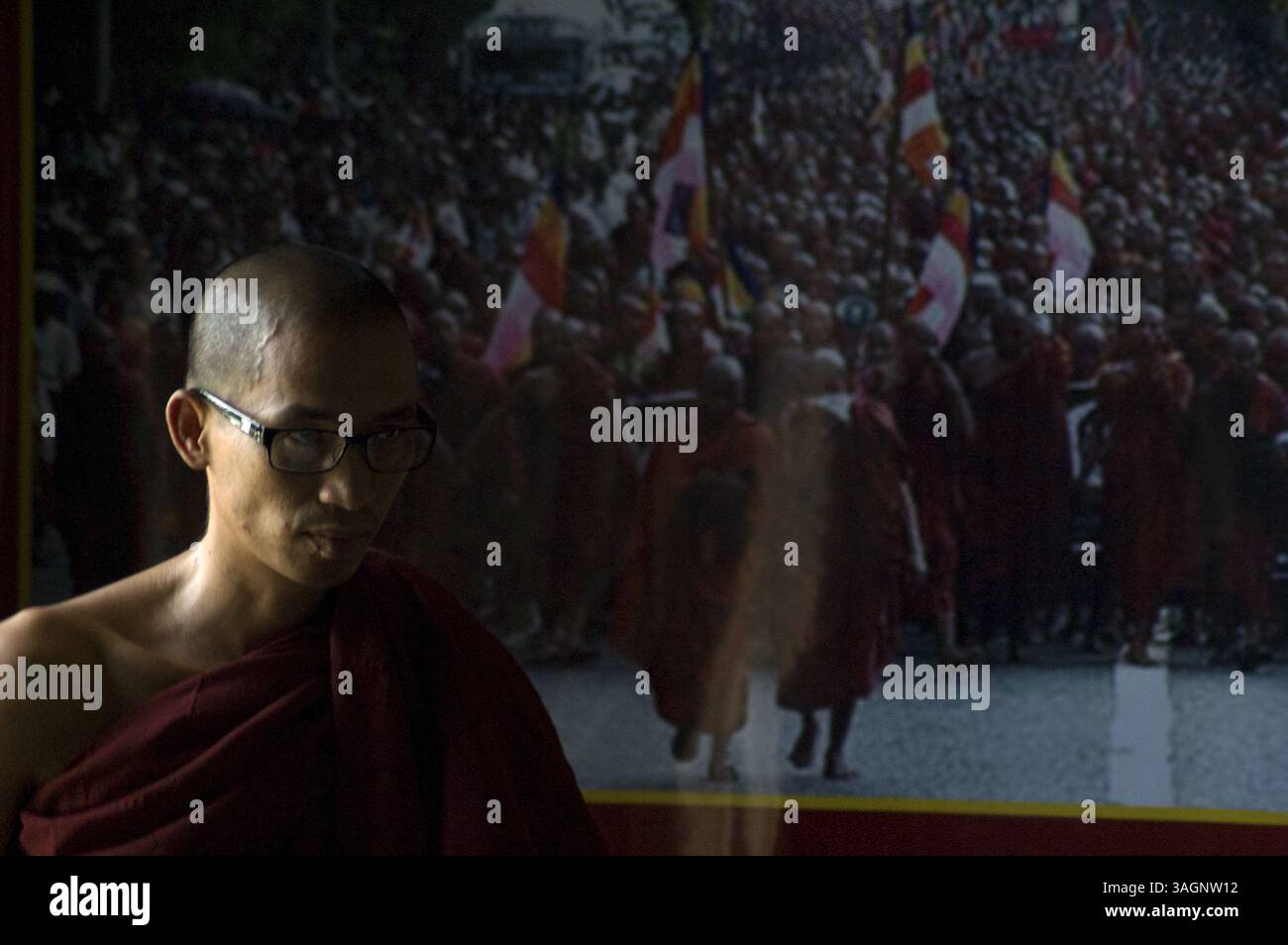 Sept. 18, 2012 - Yangon, Yangon, Myanmar - Myanmar Buddhist monk is ...