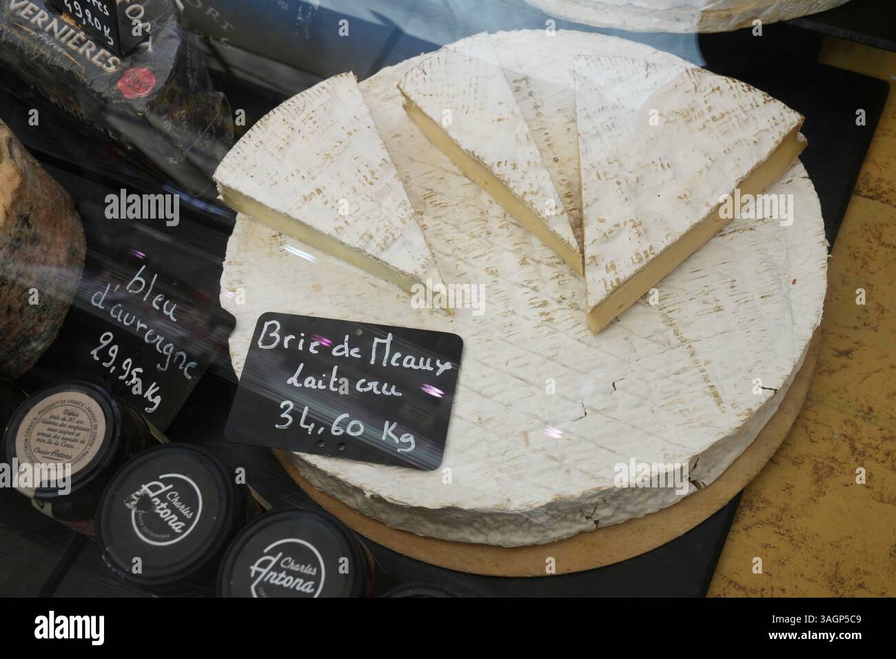 A large piece of cheese is seen at an open air market as President ...