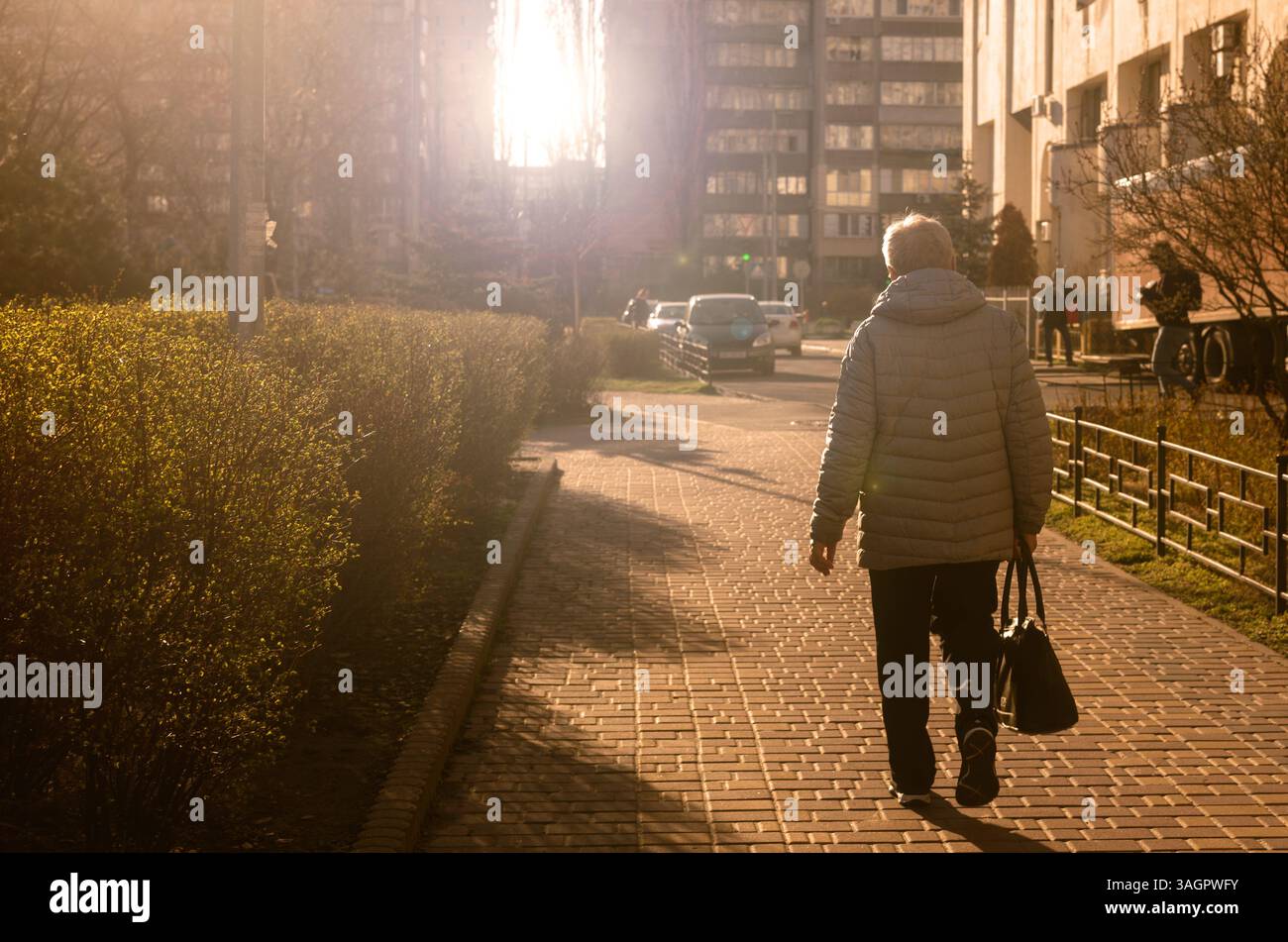 Lady walks along path hi-res stock photography and images - Alamy