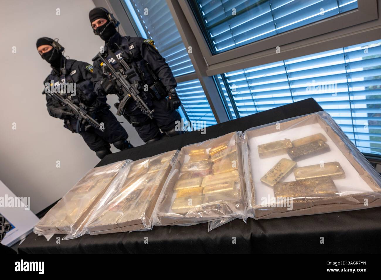 Munich, Germany. 09th Apr, 2025. Armed and masked police officers stand ...