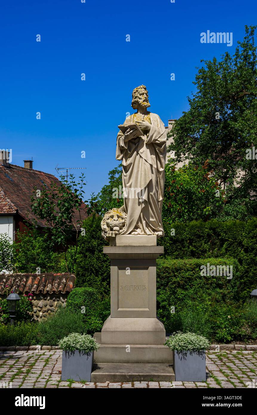 Statue of St Mark in front of the Minster of St Mary and St Mark in ...