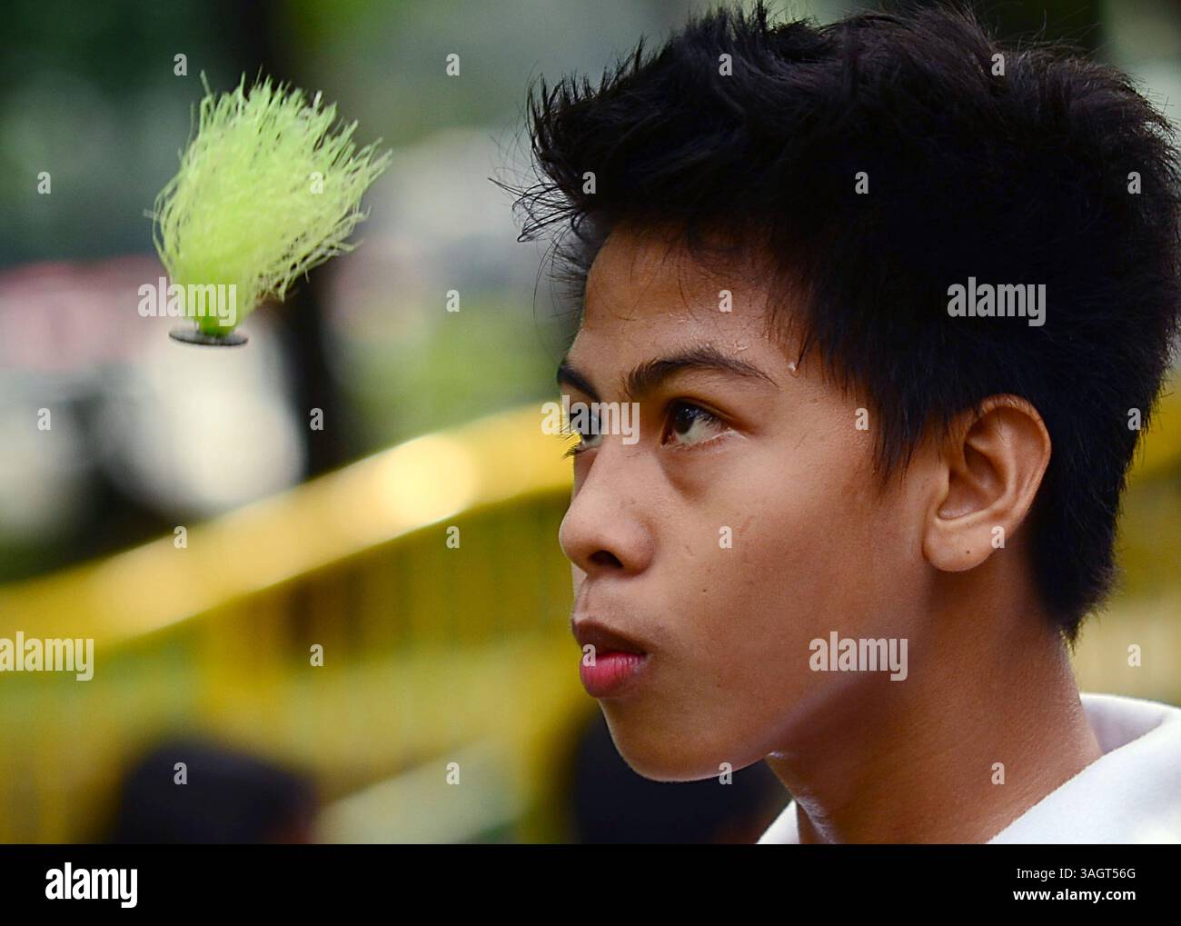Oct. 13, 2012 - Manila, Philippines - A boy plays ''sipa'' (kick ...