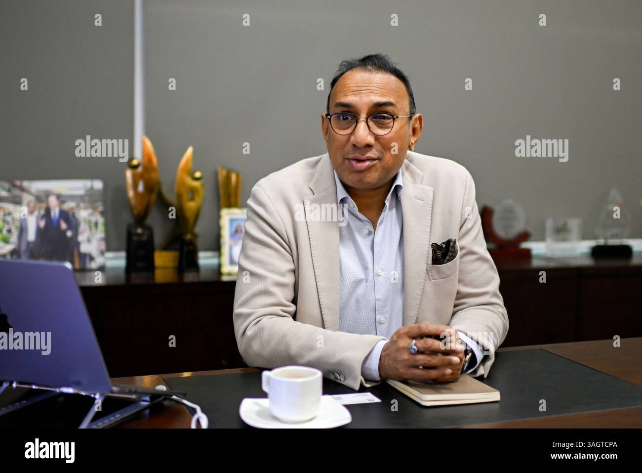 Managing Director of the Bangladesh based Urmi Group Asif Ashraf sits in his office at a factory ...