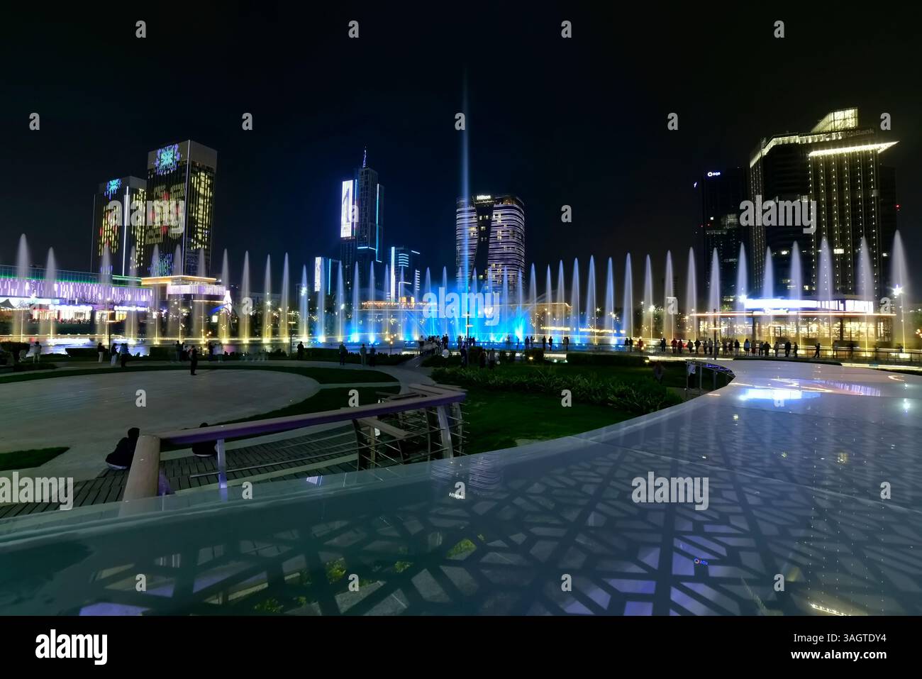 Tashkent City Park, Uzbekistan – March 23, 2025, Night view of Tashkent City Park and fountains ...