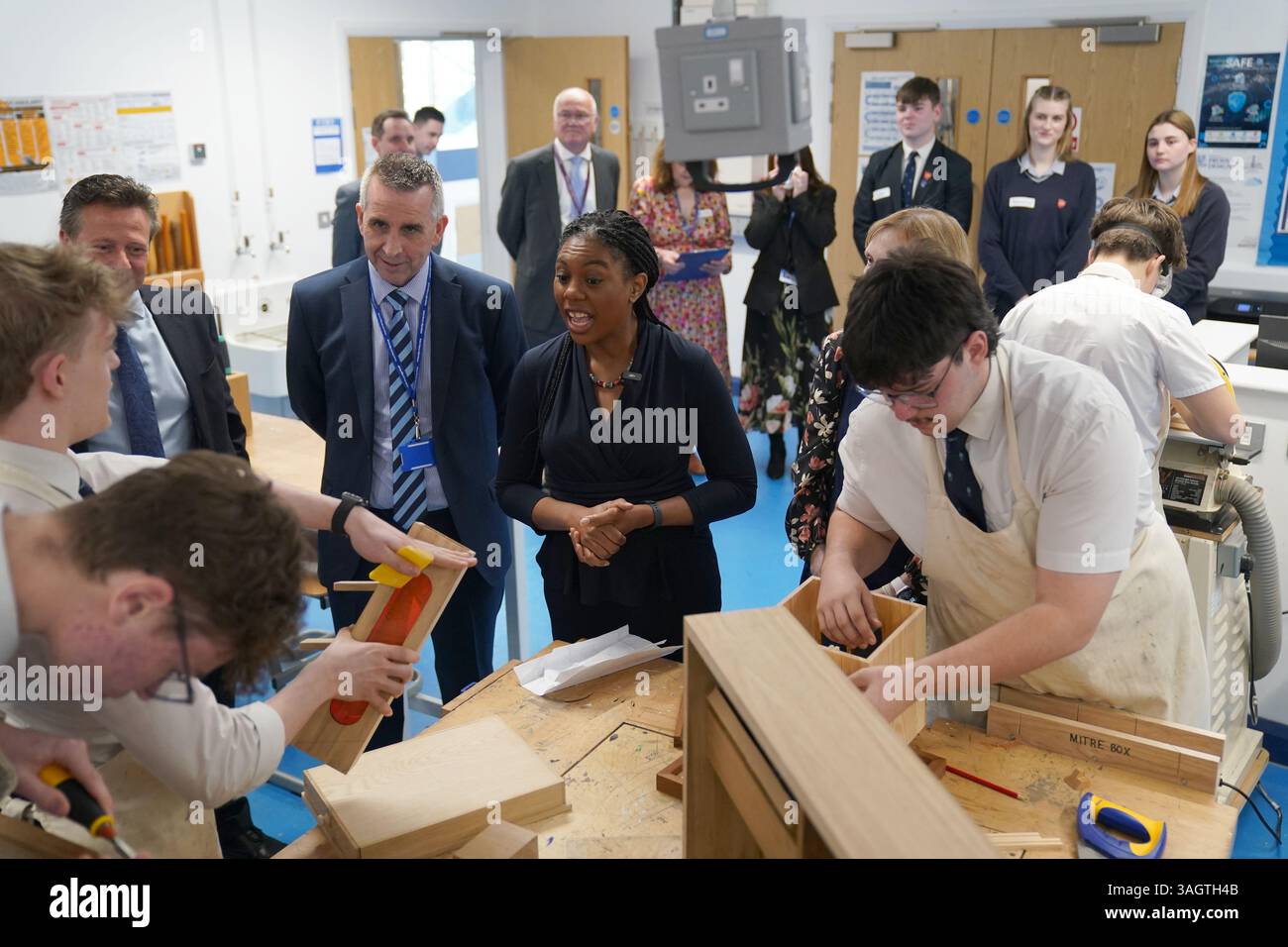 Conservative party leader Kemi Badenoch meeting students in a design ...