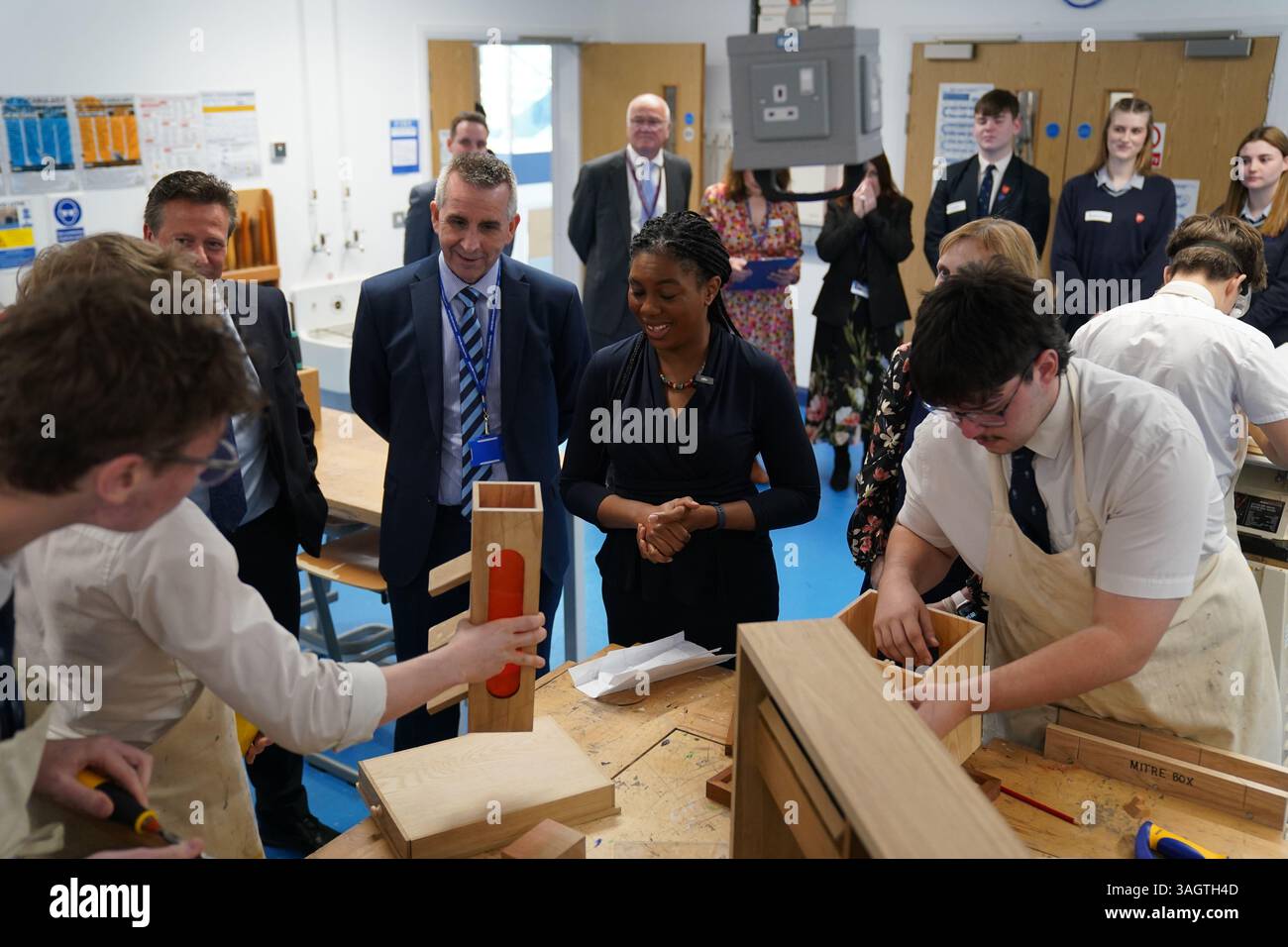 Conservative party leader Kemi Badenoch meeting students in a design ...