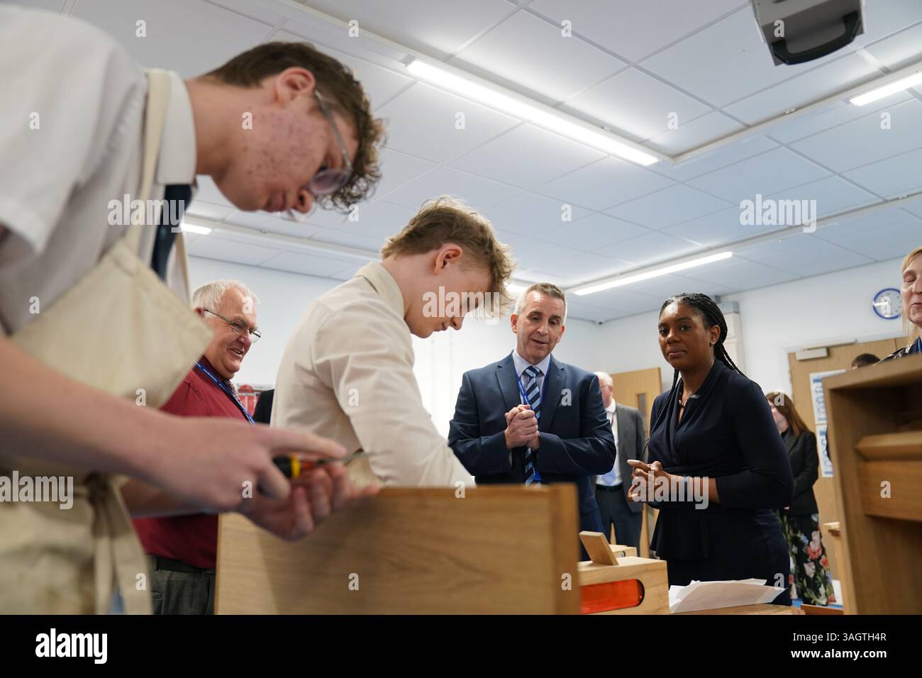Conservative party leader Kemi Badenoch meeting students in a design ...