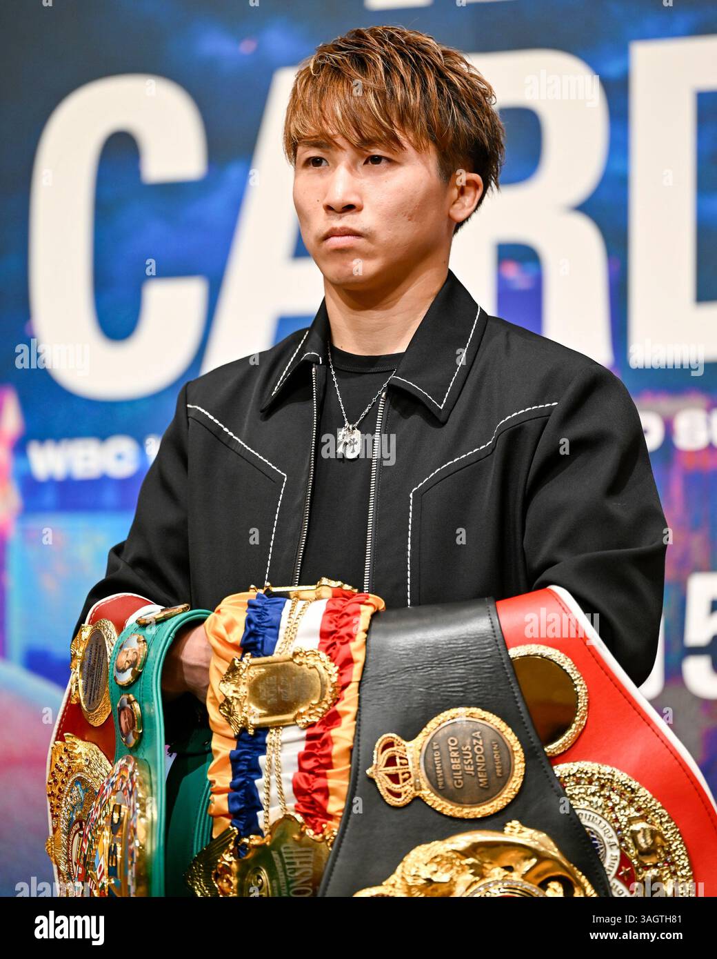 Naoya Inoue, world super bantamweight boxing champion of Japan poses during a press conference ...