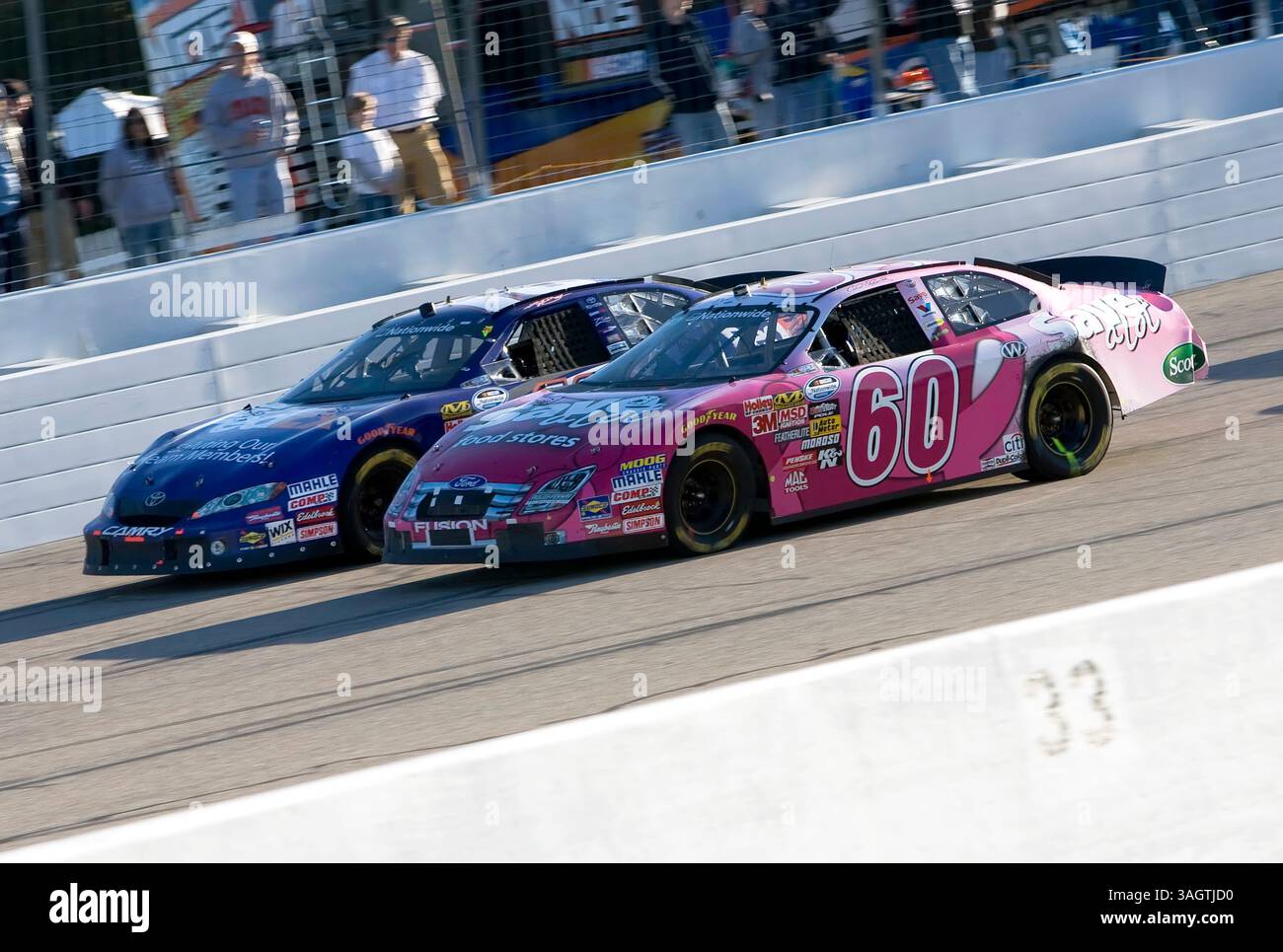 24 October, 2009: Carl Edwards and Kyle Busch race side by side during ...