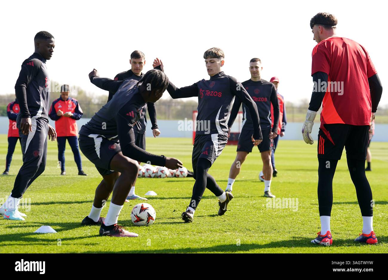 Manchester United's Alejandro Garnacho (centre) during a training ...