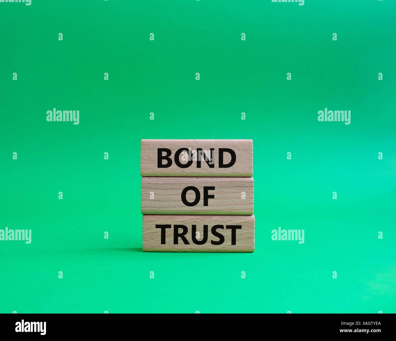 Bond of trust symbol. Wooden blocks with words Bond of trust. Beautiful ...