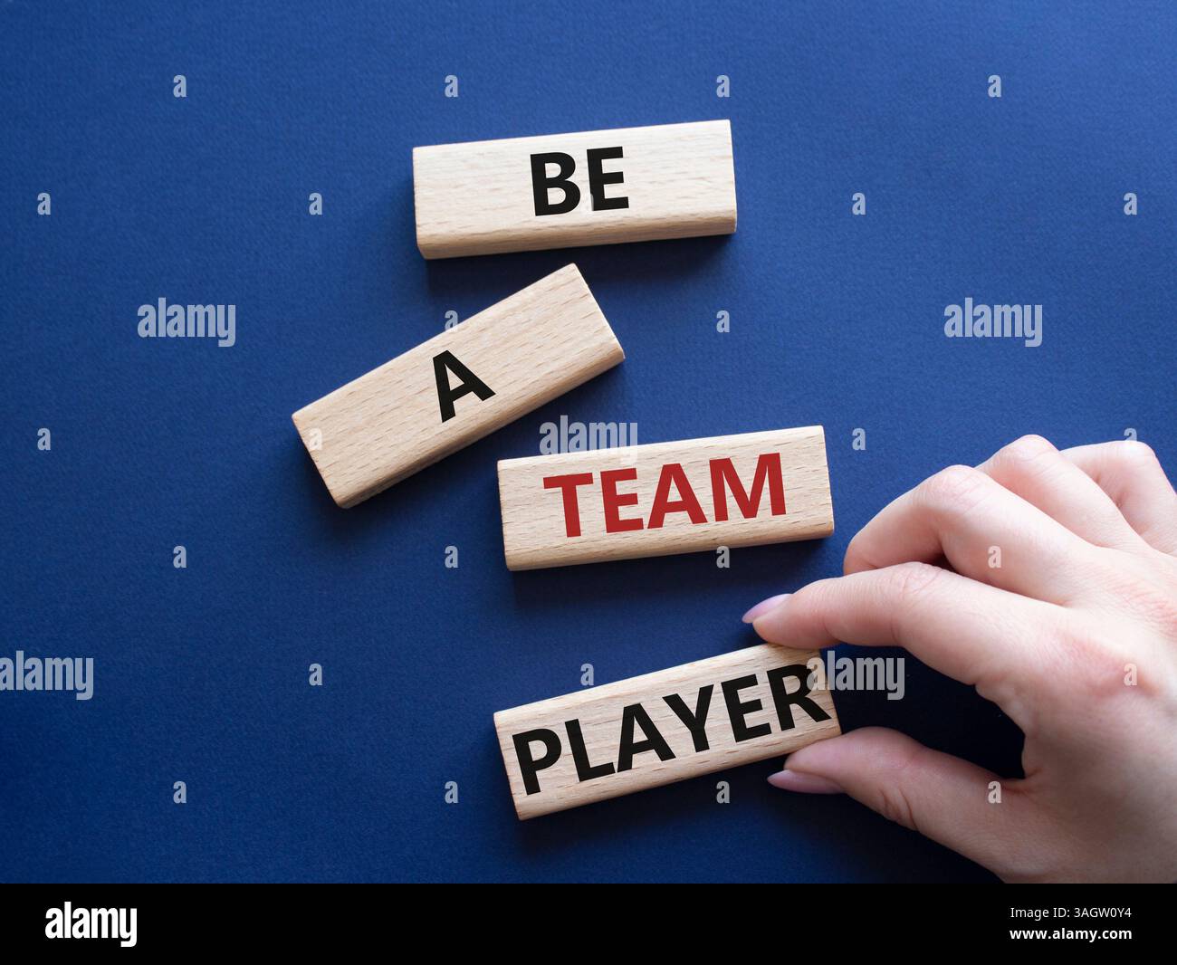 Be a team player symbol. Concept words Be a team player on wooden ...