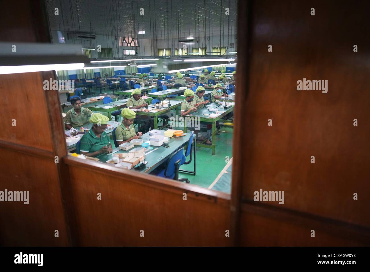 Workers are seen in a handmade jewelry factory at the Katunayake export ...
