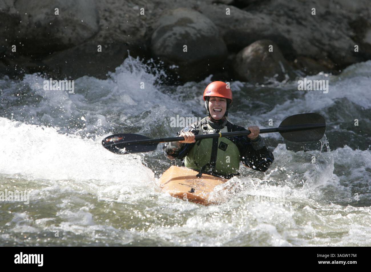Kayakers paddle through a section of the Kern River called Big Daddy ...
