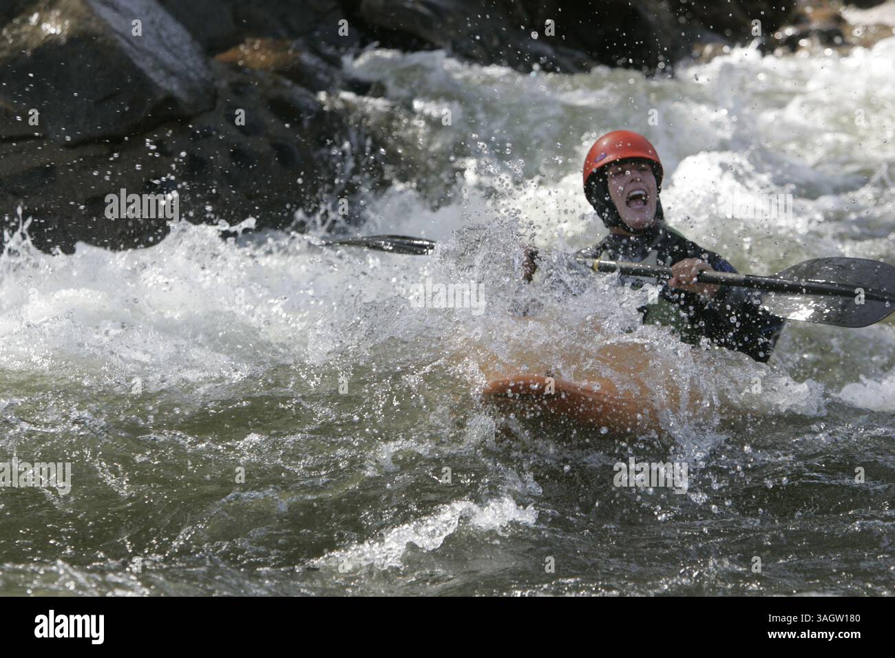 Kayakers paddle through a section of the Kern River called Big Daddy ...